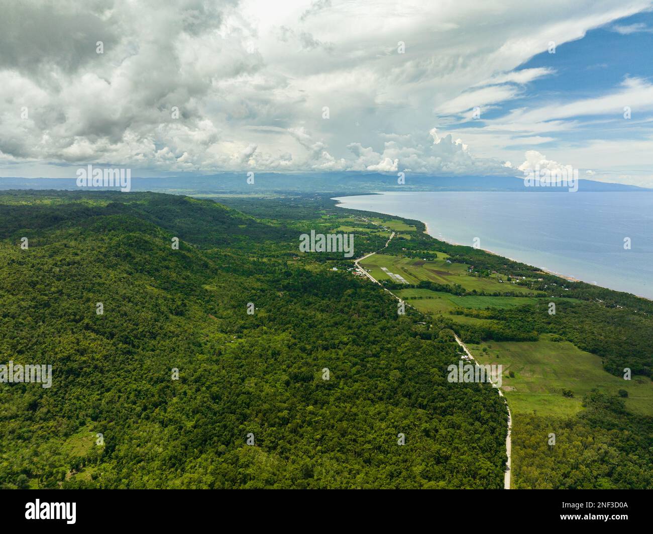 Coast of the island with farmland and jungle. Negros, Philippines Stock ...