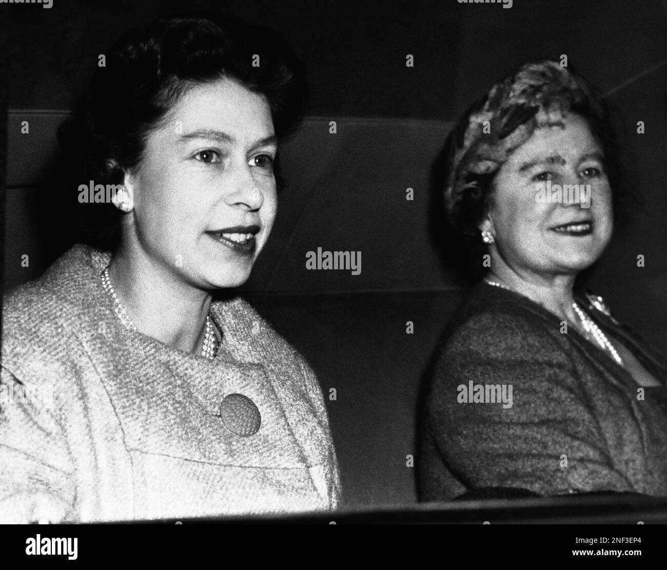 Queen Elizabeth II and the Queen Mother drive from Buckingham Palace in ...