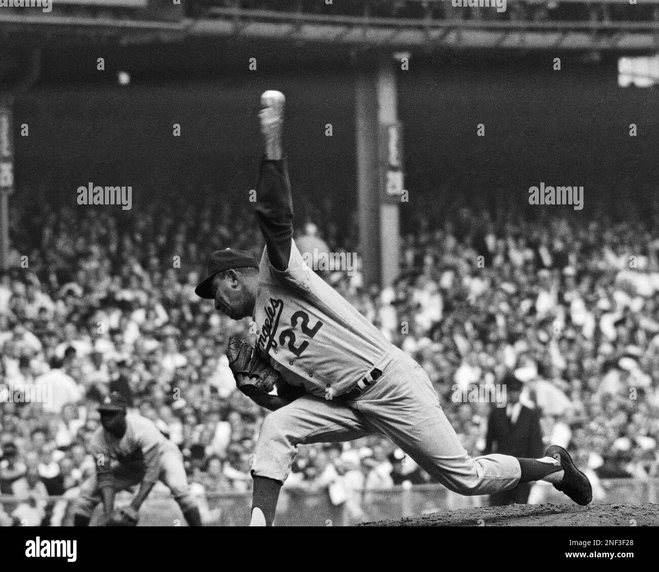 Johnny Podres, Los Angeles Dodgers left hander, is shown as he pitched ...