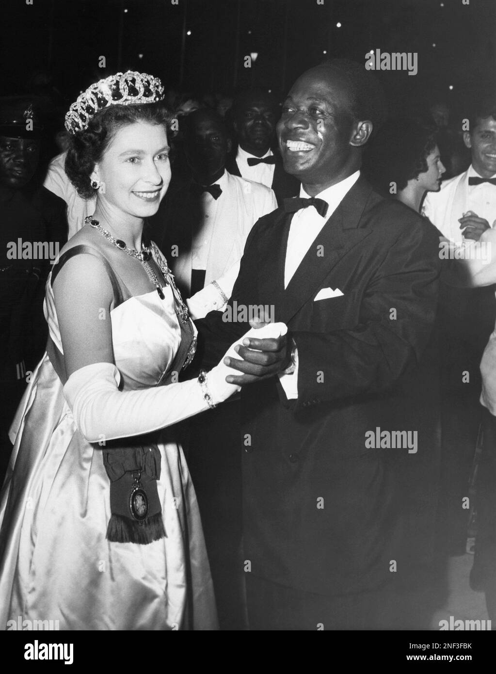 Queen Elizabeth II is partnered by Ghana President Kwame Nkrumah as ...