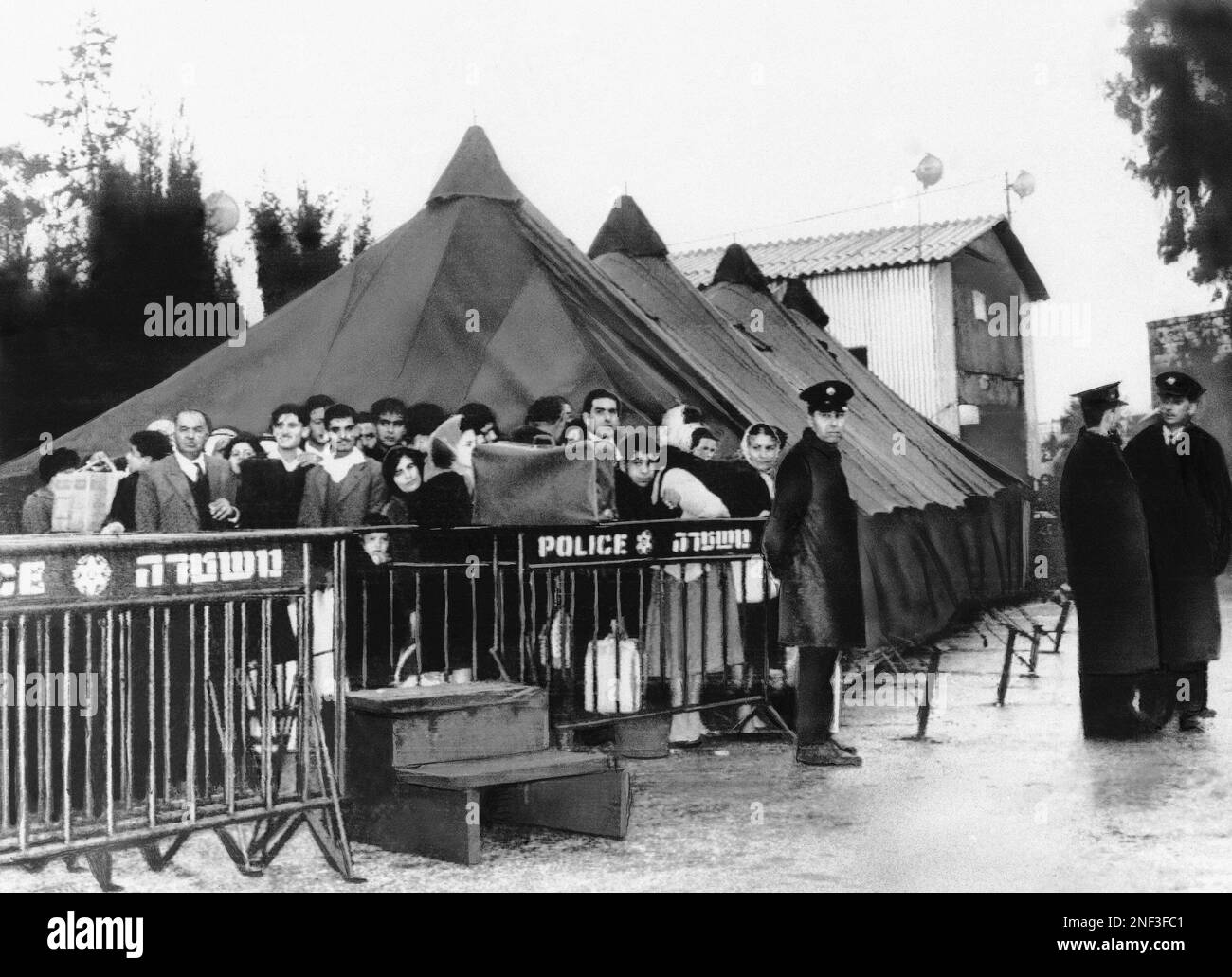 Christian Arab Residents of Israel line up at Mandelbaum Gate. Ready to ...