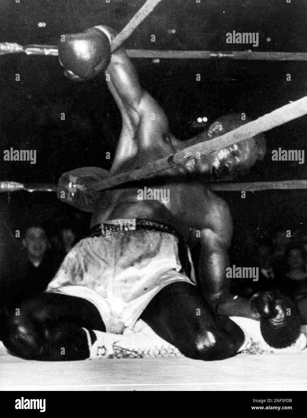 Cuban-born Benny 'Kid' Paret; 25 years-old; slumps to the canvas at ...