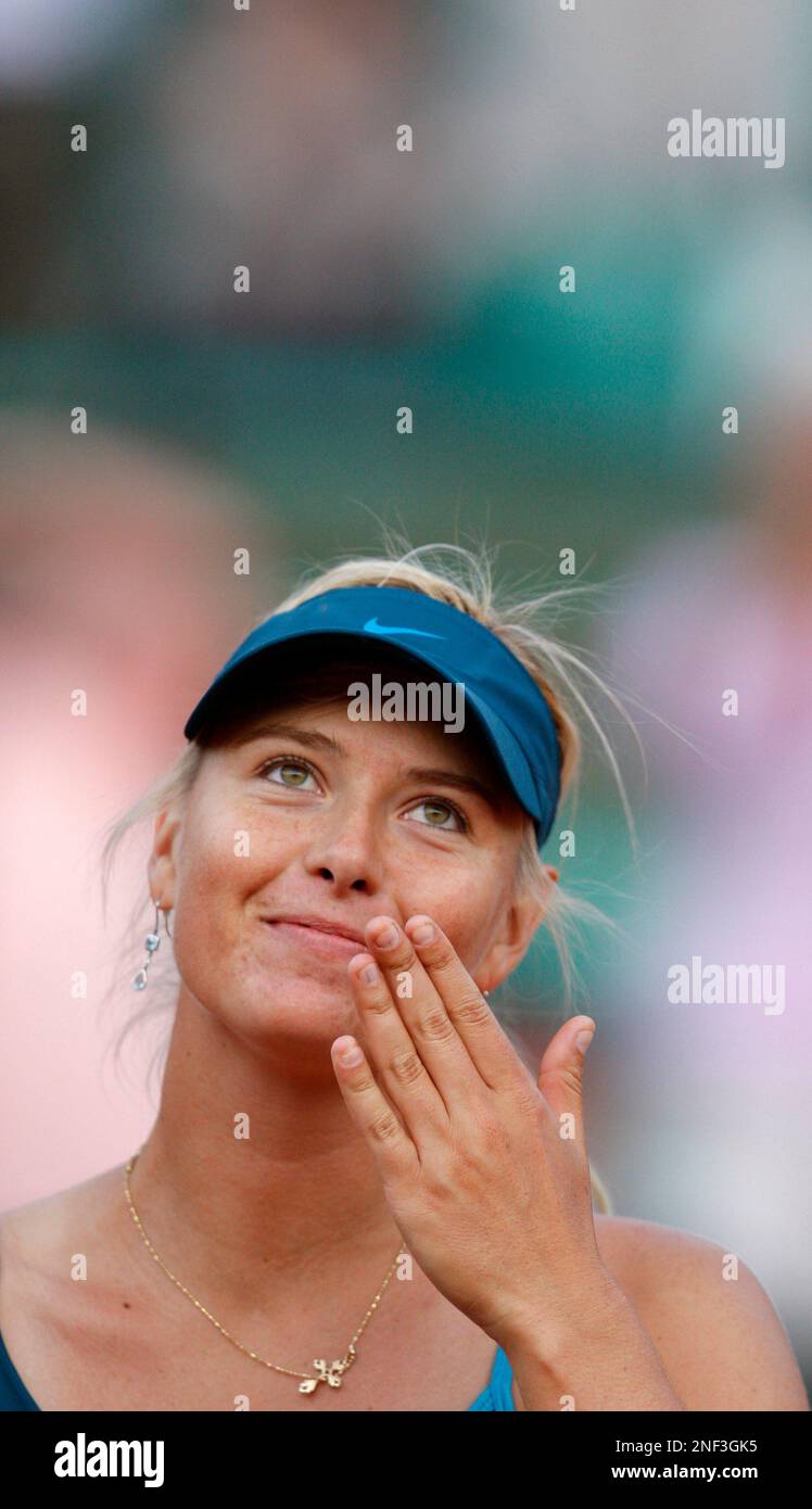 Russia's Maria Sharapova blows a kiss to the public after defeating ...