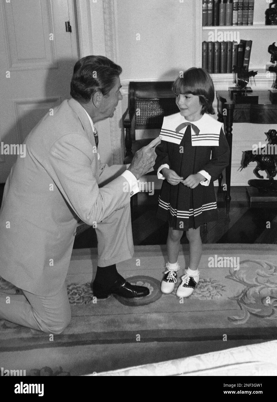 President Ronald Reagan talks with Valerie Kurth, six-year-old from ...