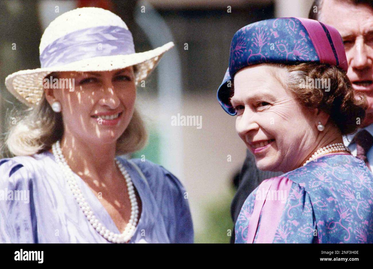 Britain's Queen Elizabeth II smiles at the reception of the crowd, in ...