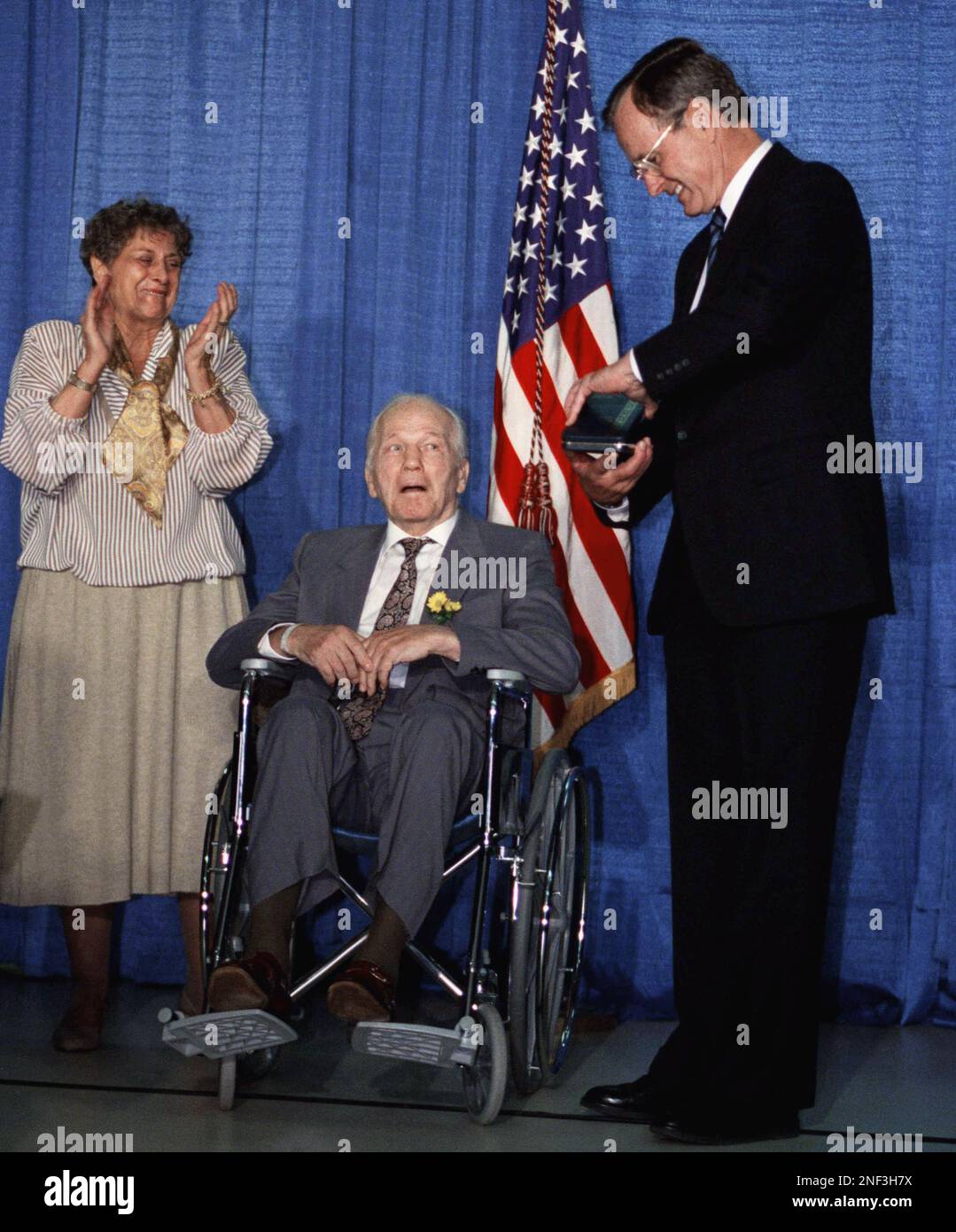 President George Bush presents former middleweight champion Tony Zale ...