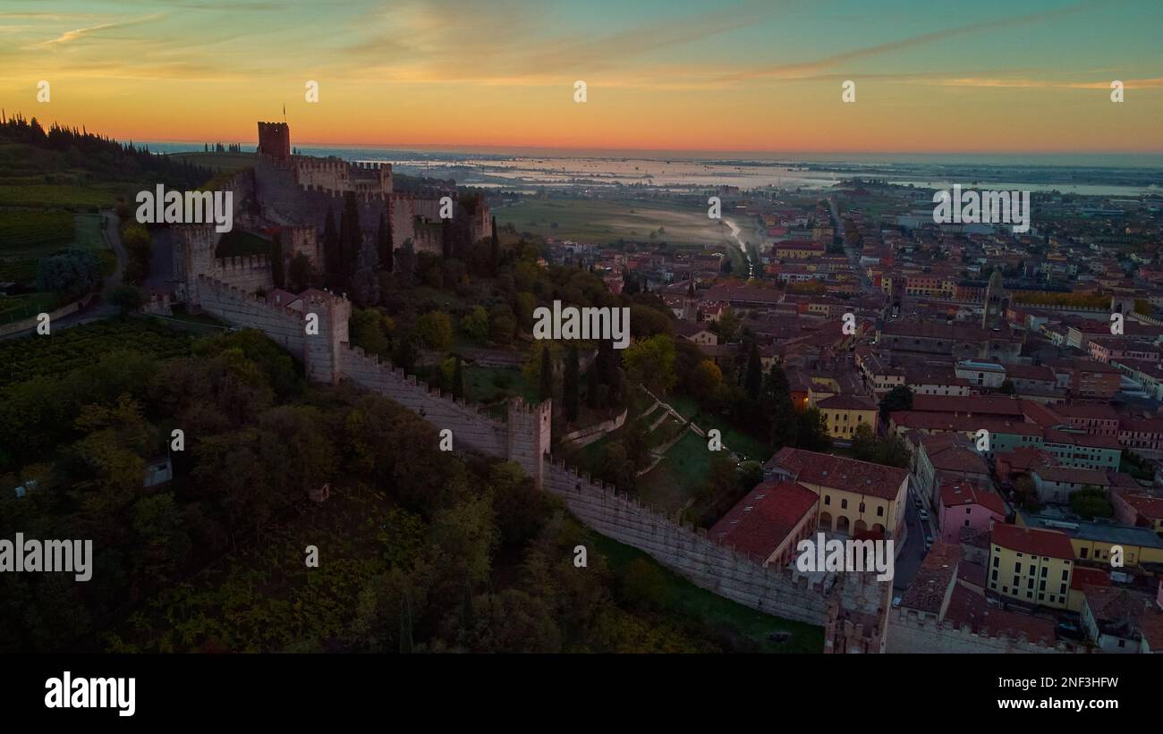 An aerial view of the medieval Soave Castle in Veneto region at sunset ...