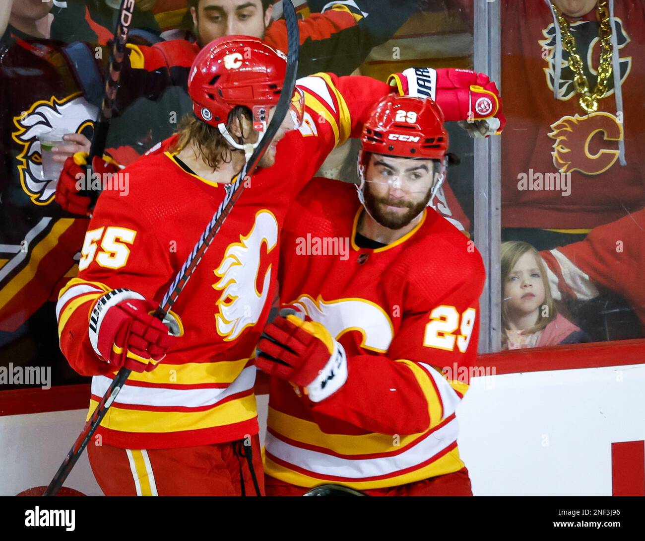 Calgary Flames forward Dillon Dube, right, celebrates his goal with ...