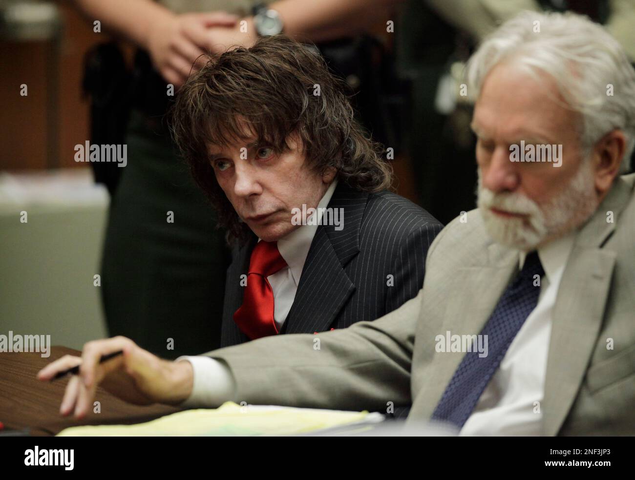 Music producer Phil Spector, left, and his attorney Dennis Riordan ...