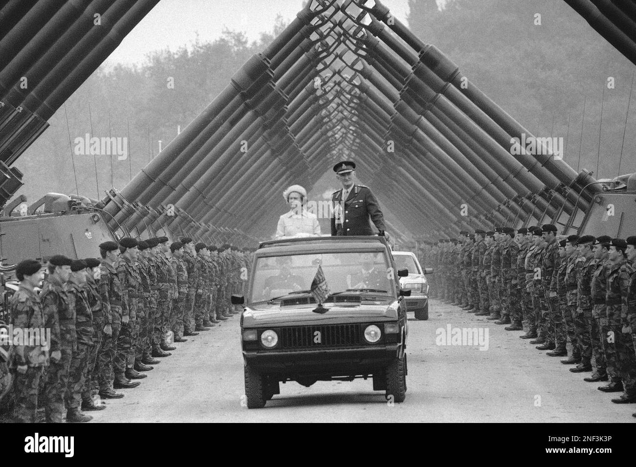 Queen Elizabeth II arrives through the avenues of guns during 2nd day ...