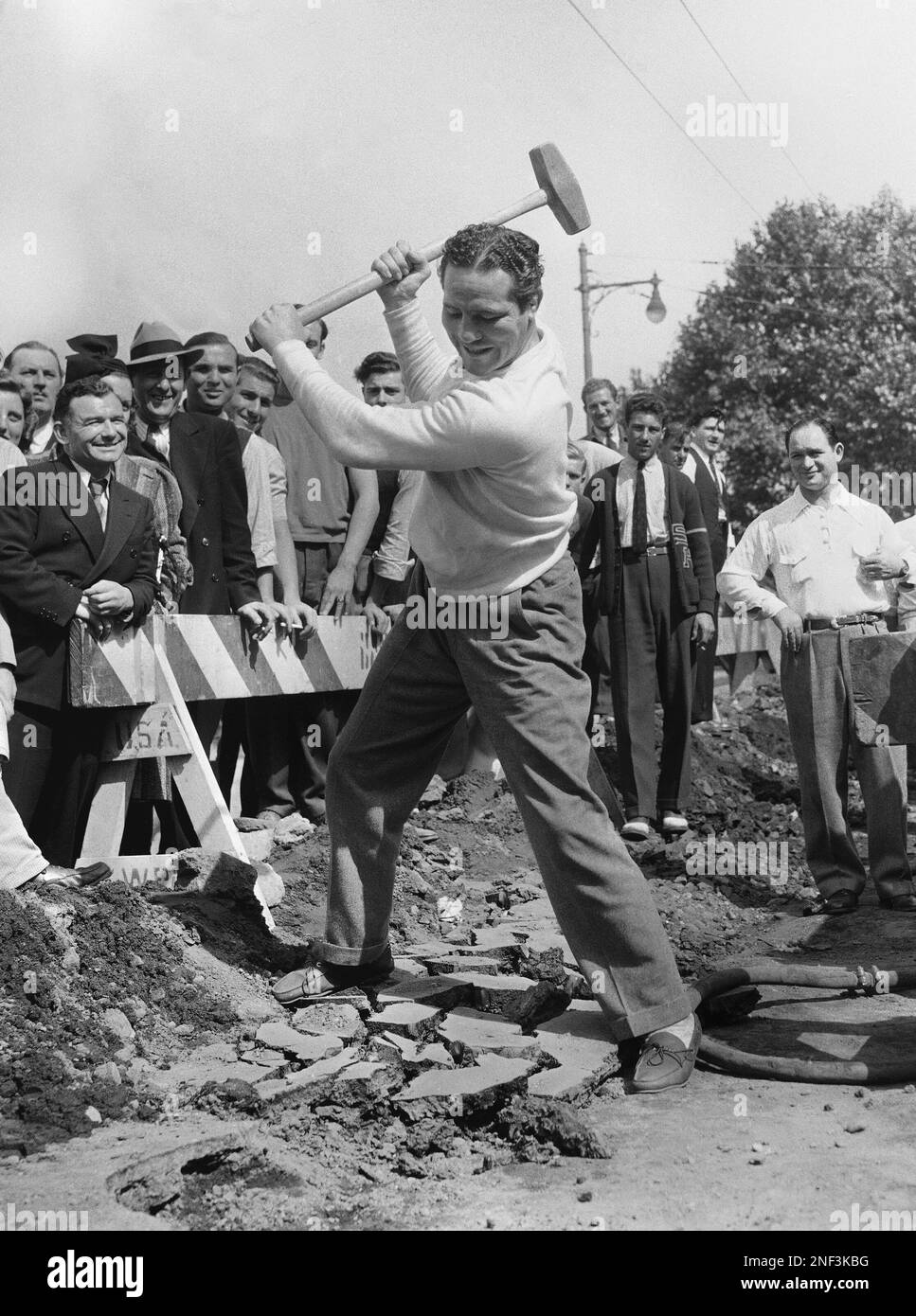 Max Baer picked up the sledge and whaled away at pavement near ...