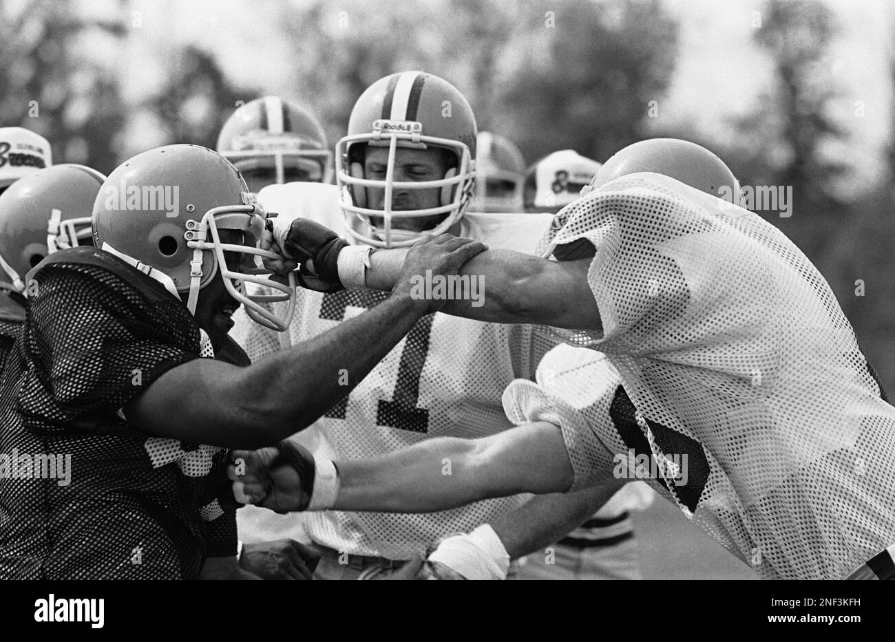 Cleveland Browns offensive tackle Joel Patten, right, lands a punch to ...