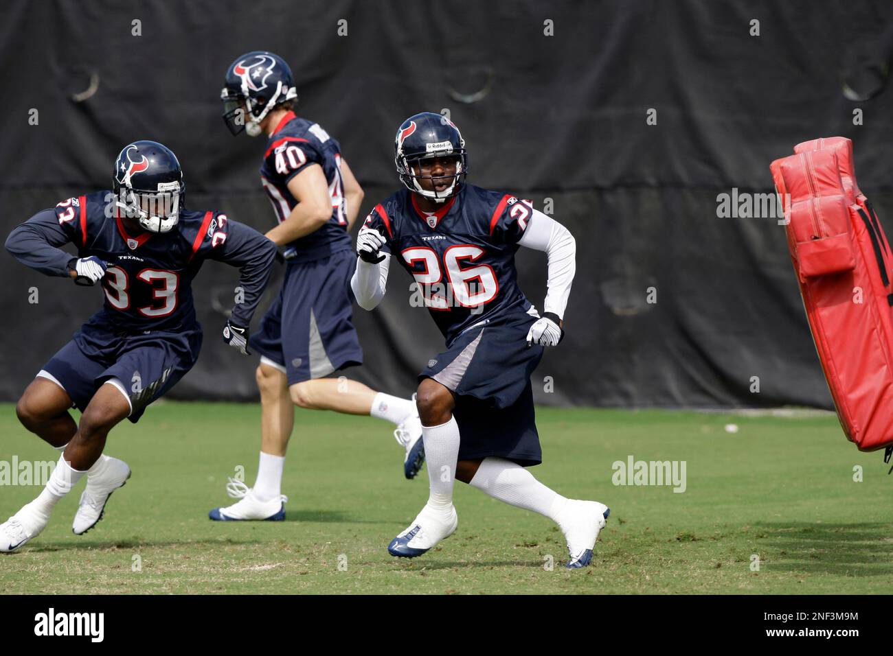 Houston Texans' Eugene Wilson (26) and Troy Nolan (33) during an NFL ...