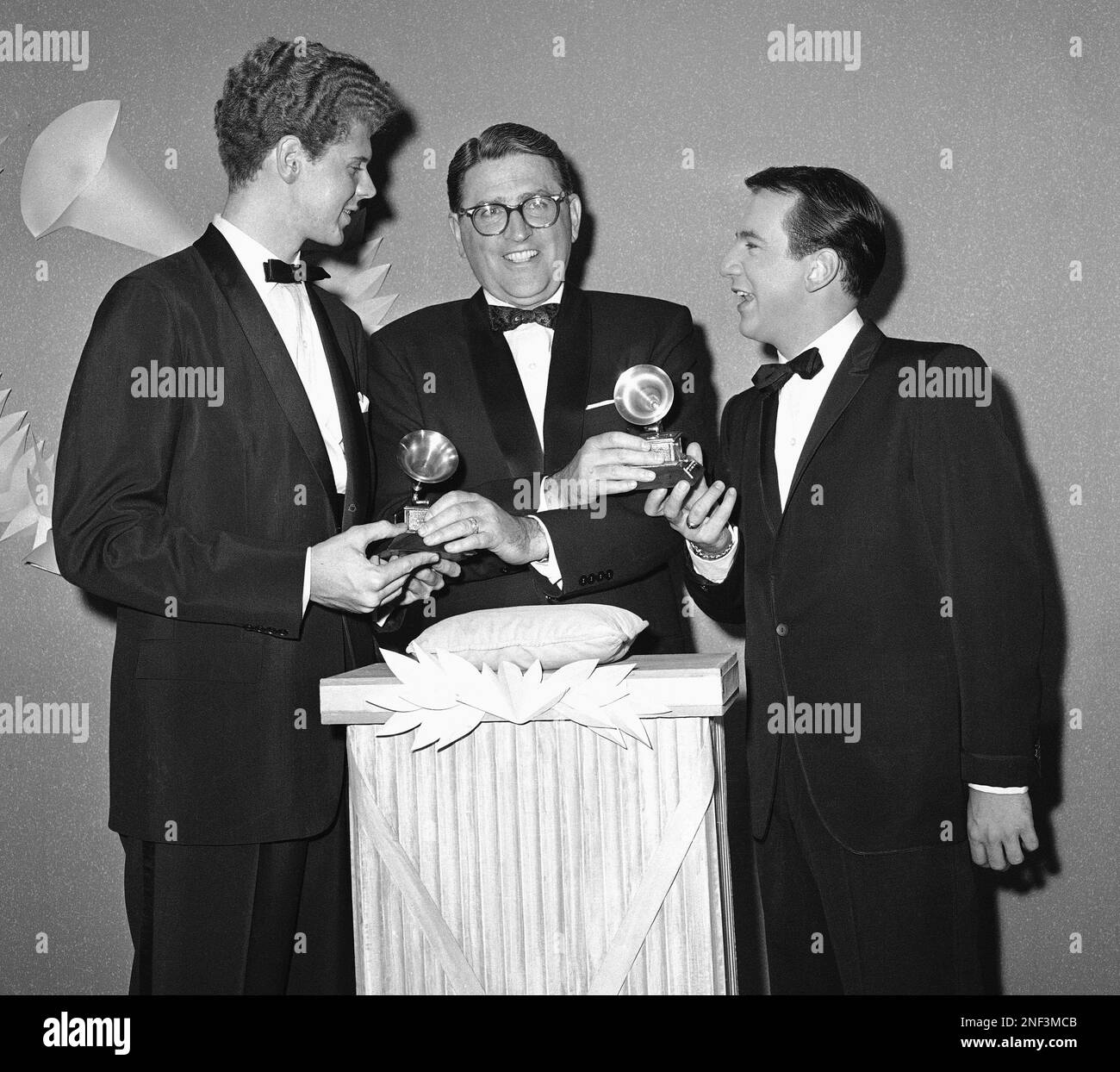 Master of ceremonies Meredith Wilson, center, presents Grammy Awards at ...