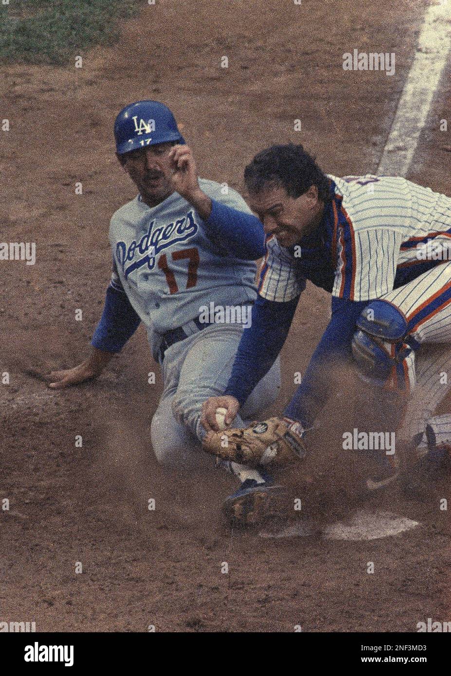 Los Angeles Dodgers Rick Dempsey, left, is sate at home in the seventh ...