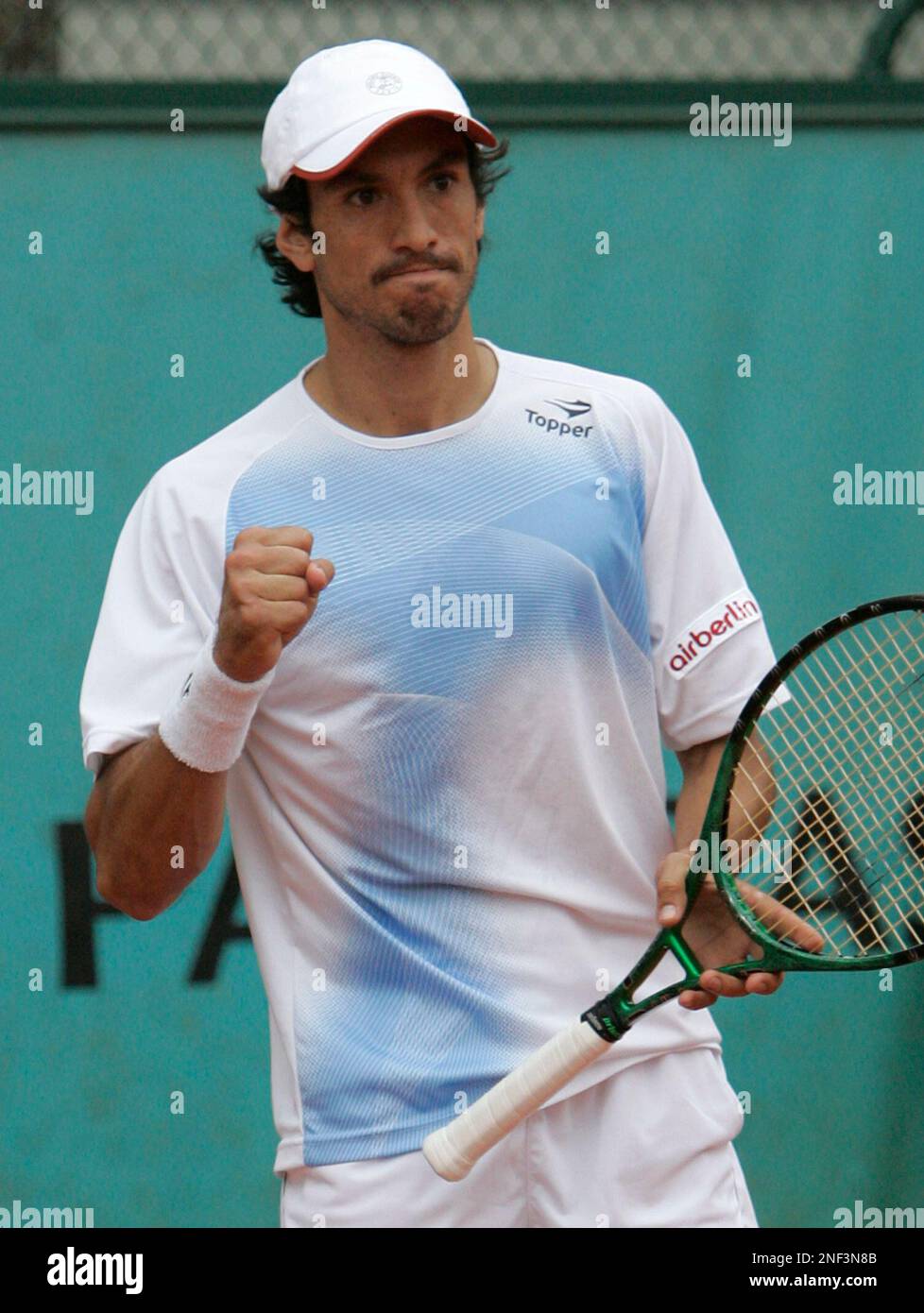 Argentina's Martin Vassallo Arguello reacts as he plays Russia's Igor ...