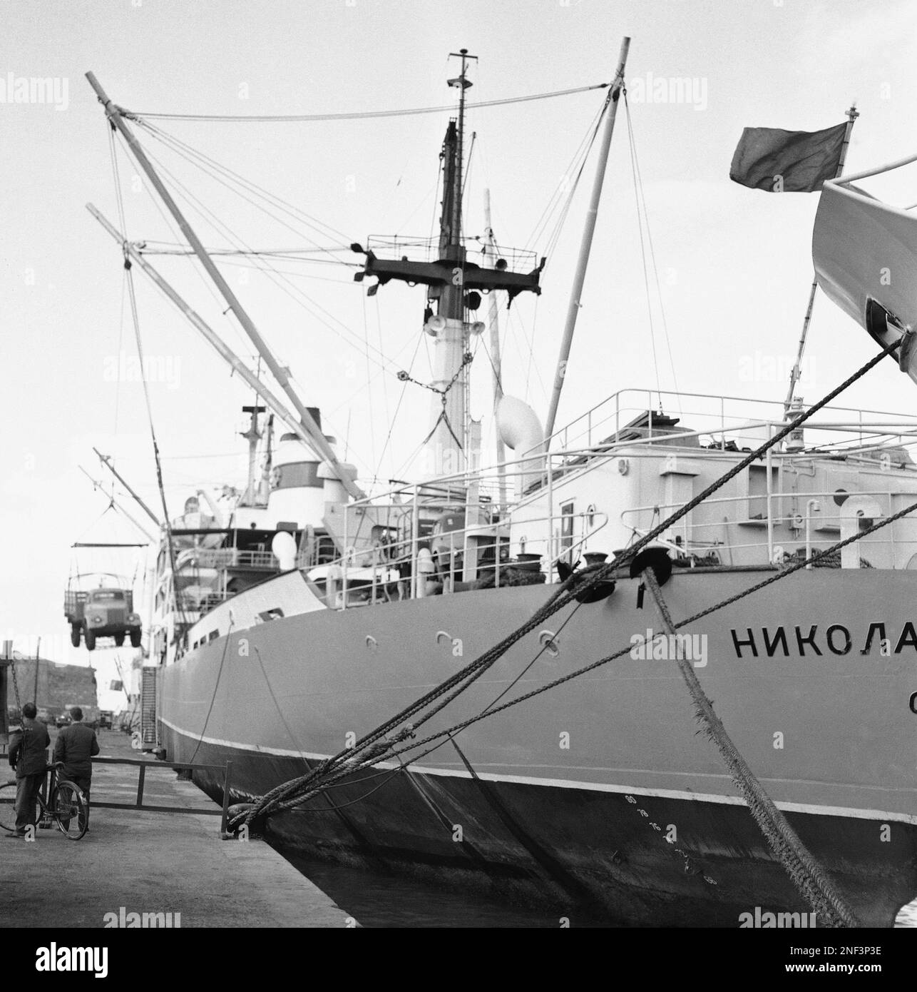 Soviet ship Nicolay Burdenko unloading trucks on Dec. 16, 1964 in the ...
