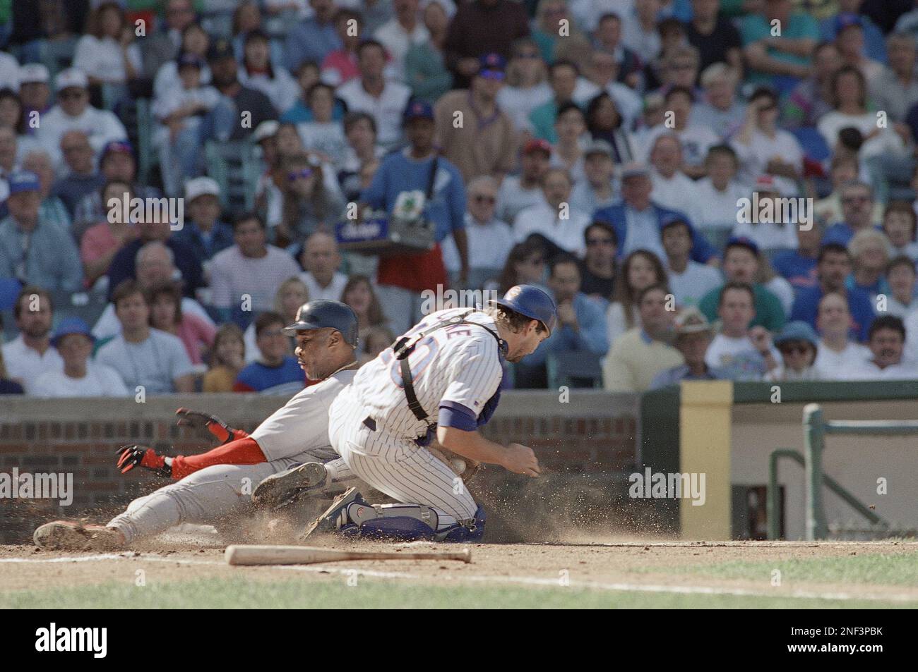 St. Louis Cardinals’ Mark Whiten slides home safely past Chicago Cubs ...