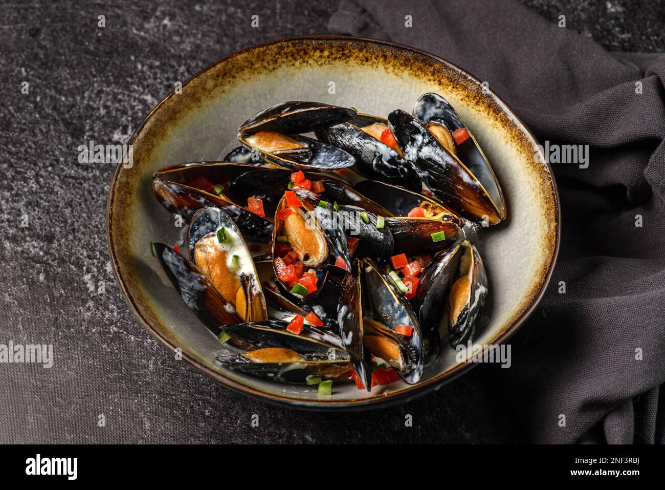 mussels with shells in tomato sauce. High quality photo Stock Photo - Alamy