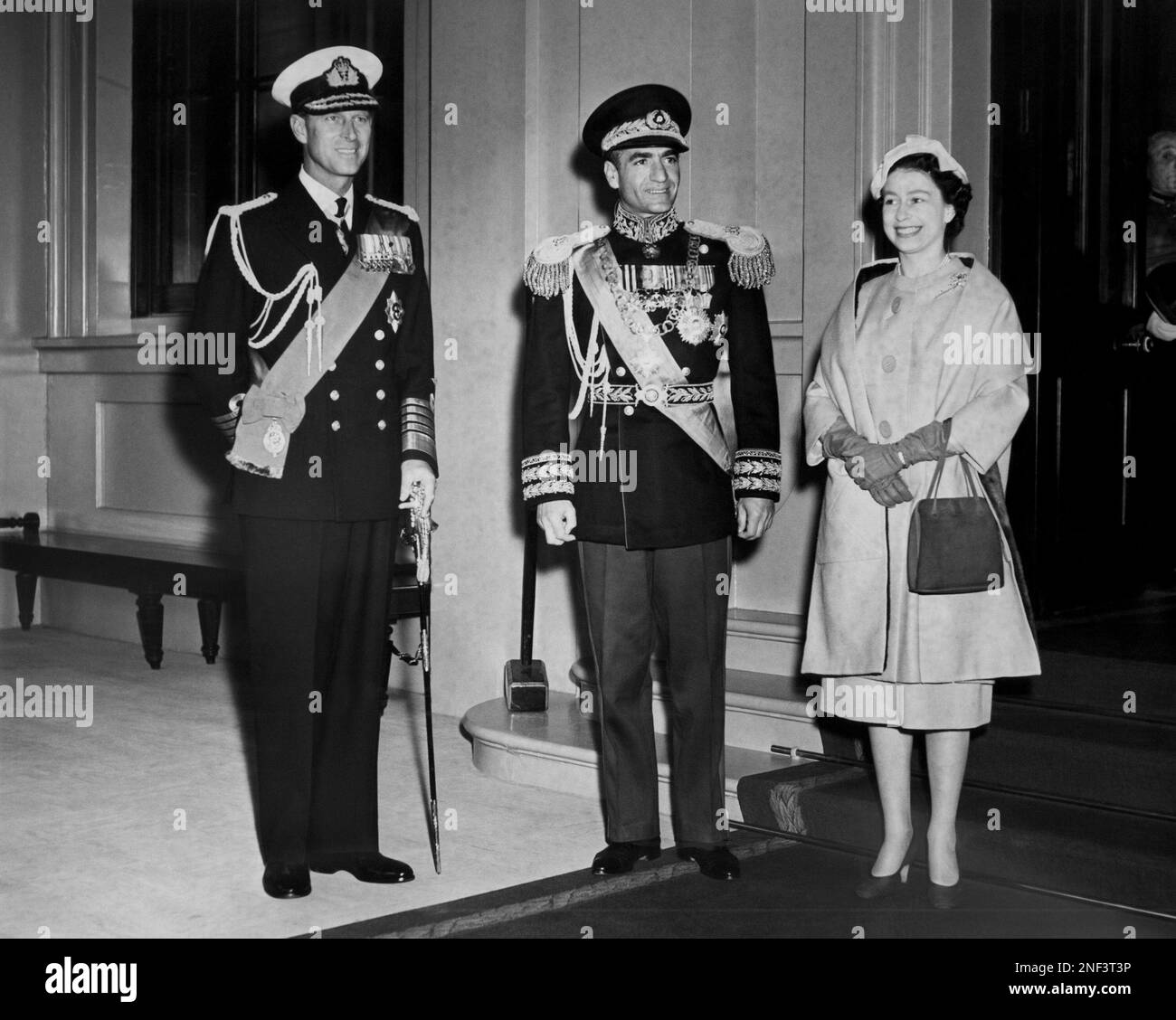 Shah Mohammed Reza Pahlavi of Persia, center, poses with Queen ...