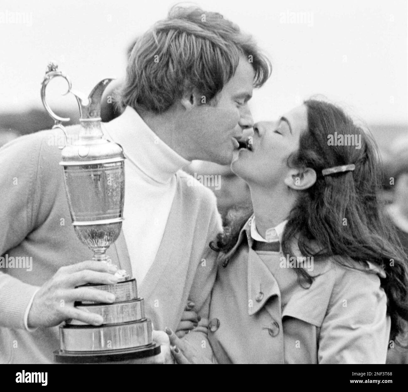American golfer Tom Watson receives a kiss from his wife Linda after he ...