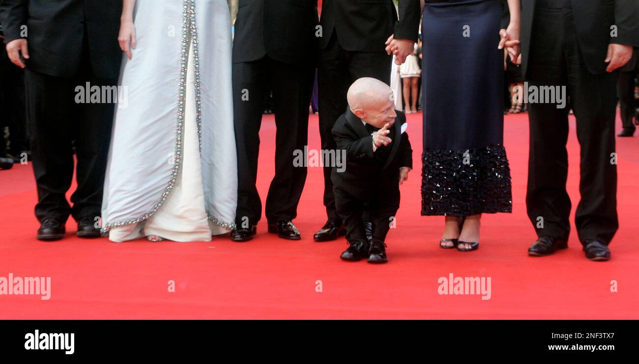 American actor Verne Troyer gestures as he arrives on the red carpet ...
