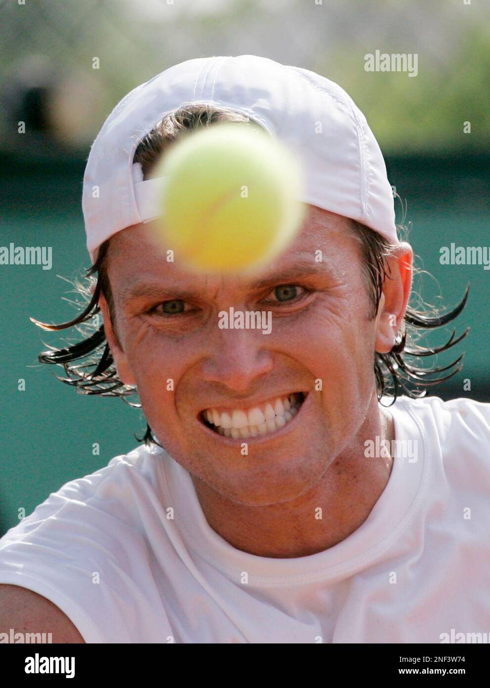 U.S. player Robert Kendrick eyes the ball to Germany's Daniel Brands ...