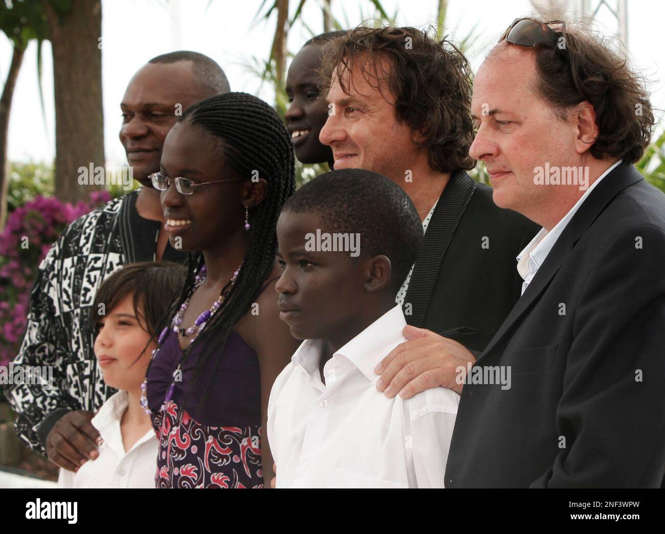 From back row left, actors Abby Mukiibi Nkaaga, Tumelo Sibanda, Belgian ...