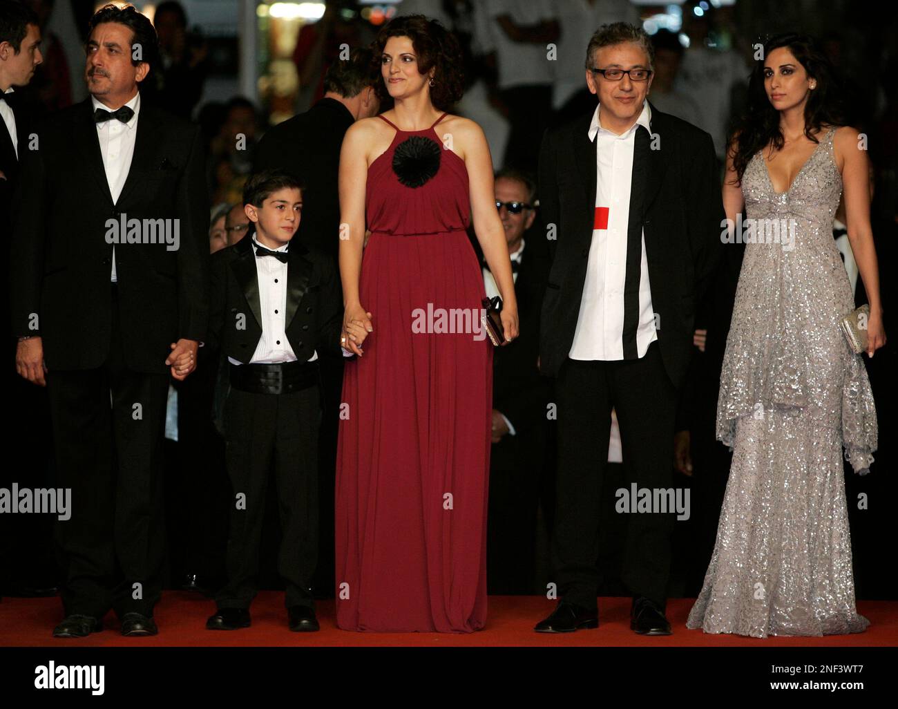 Actor Zuhair Abu Hanna, second from left, Samar Qudha Tanus, center ...