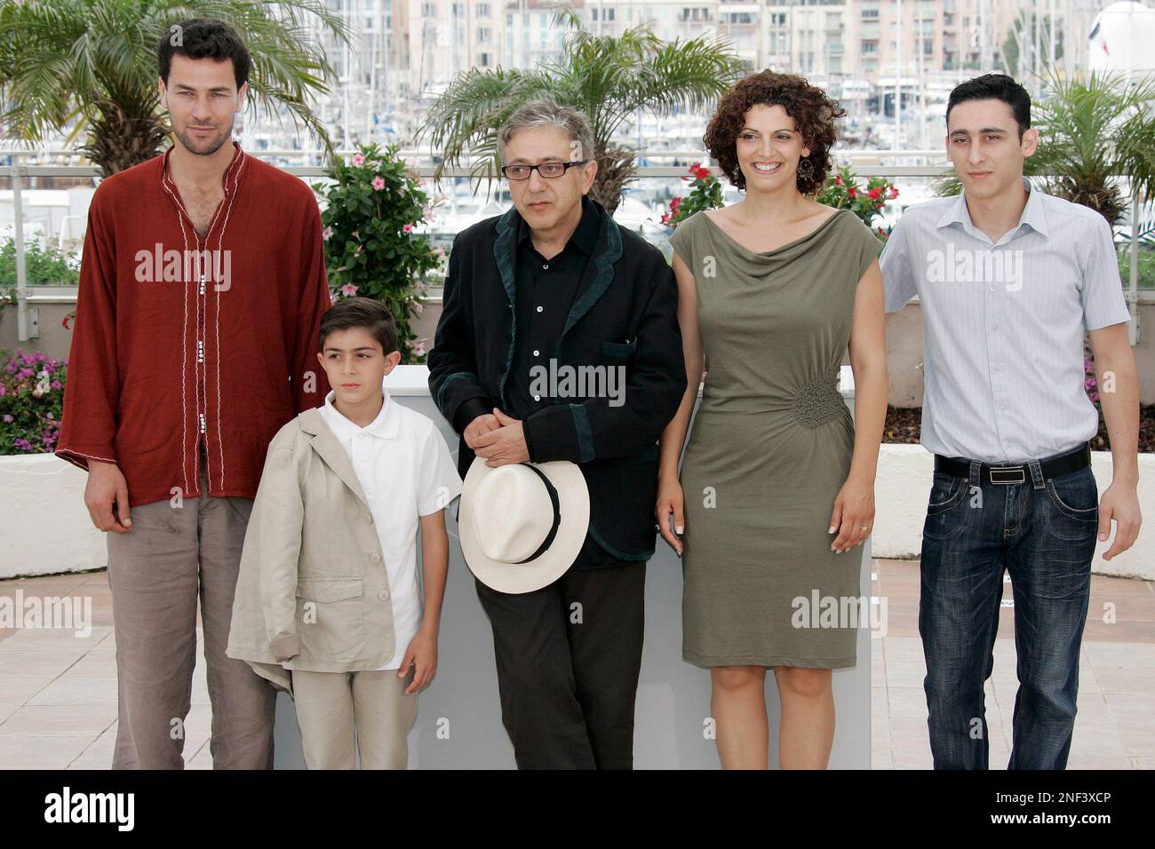 From left, actors Saleh Bakri, Zuhair Abu Hanna, Palestinian director ...