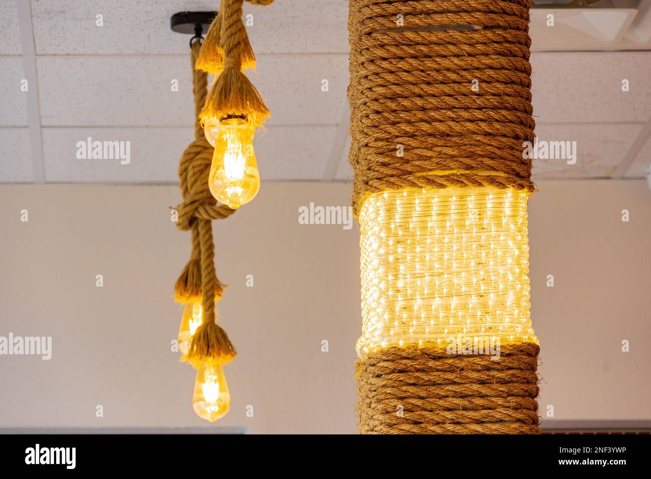 Interior view of a restaurant with bulb, rope decoration at Texas Stock ...