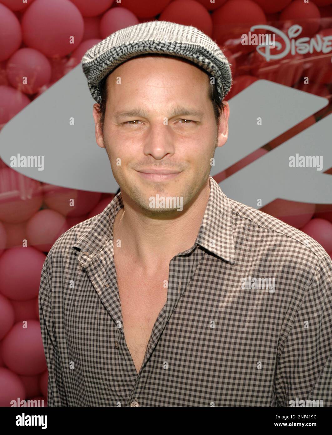 Actor Justin Chambers arrives at the premiere of the animated feature ...