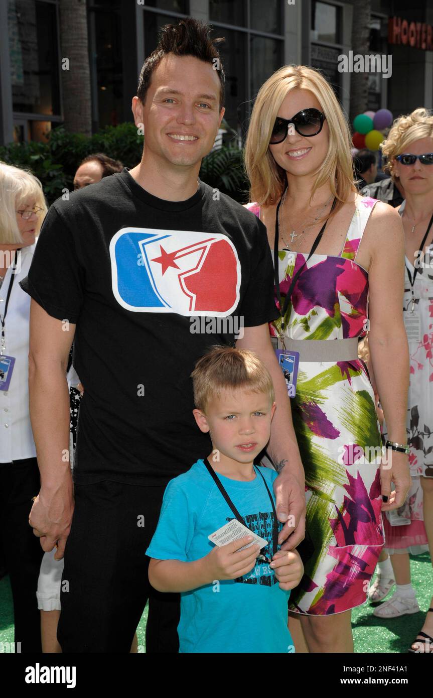 Singer and musician Mark Hoppus, left, his wife Skye Everly, right, and ...