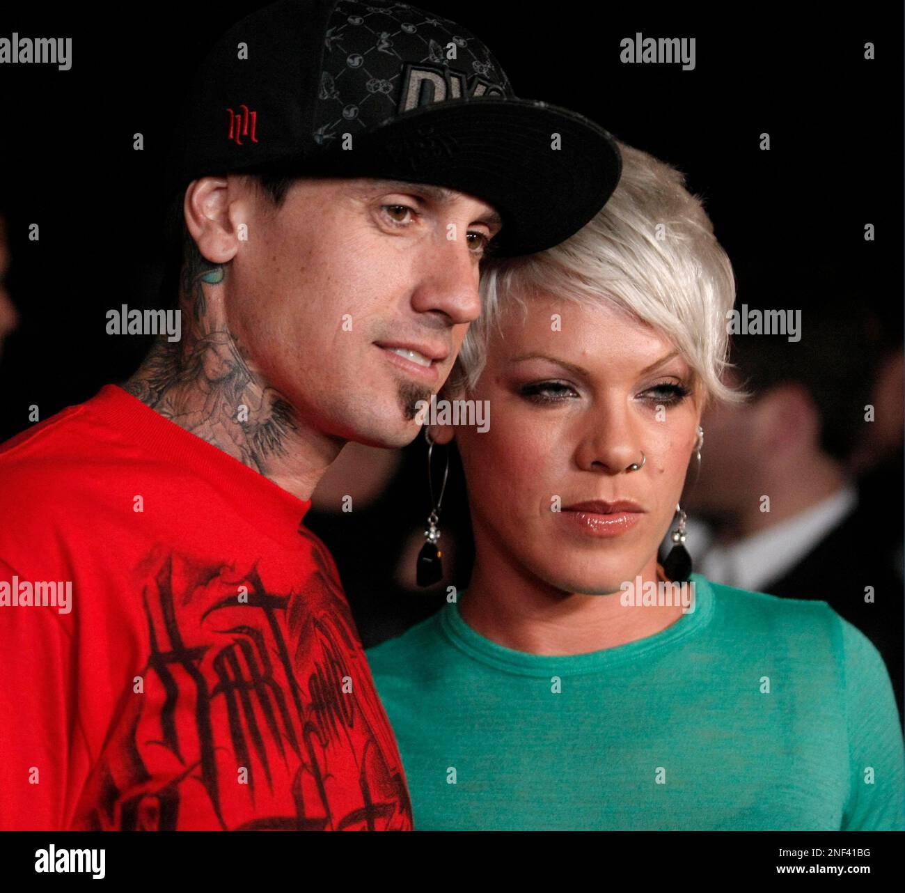 Singer Pink and her husband Carey Hart arrive at the T-Mobile Sidekick ...