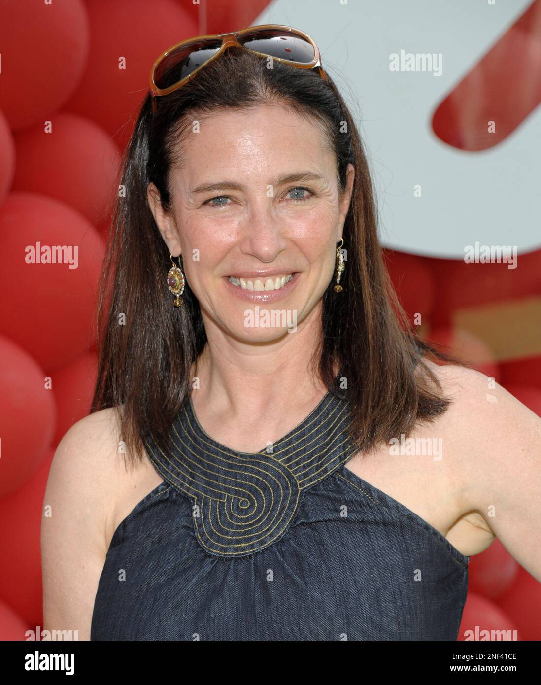 Actress Mimi Rogers arrives at the premiere of the animated feature ...