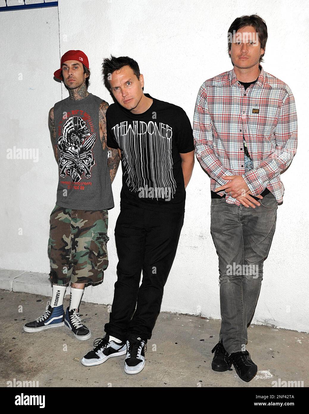 From left to right, drummer Travis Barker, singer and musician Mark ...