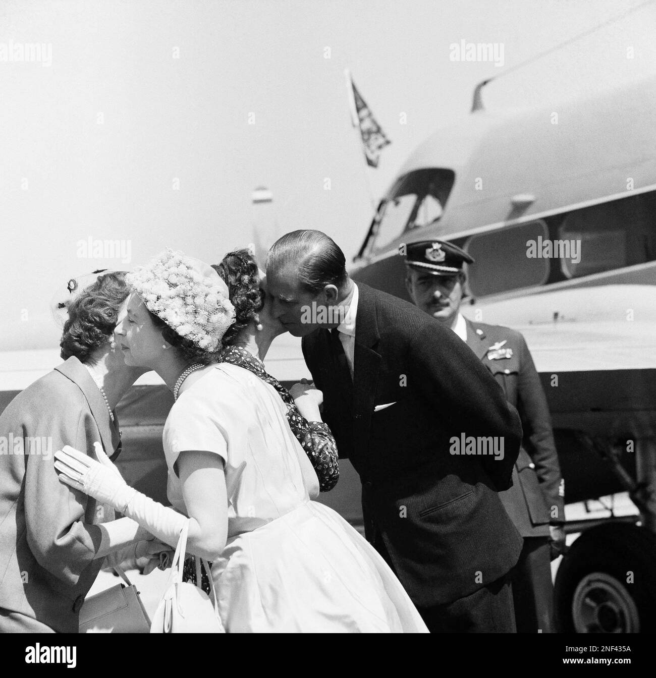 Queen Elizabeth II kisses former Queen Helen of Romania, and Prince ...