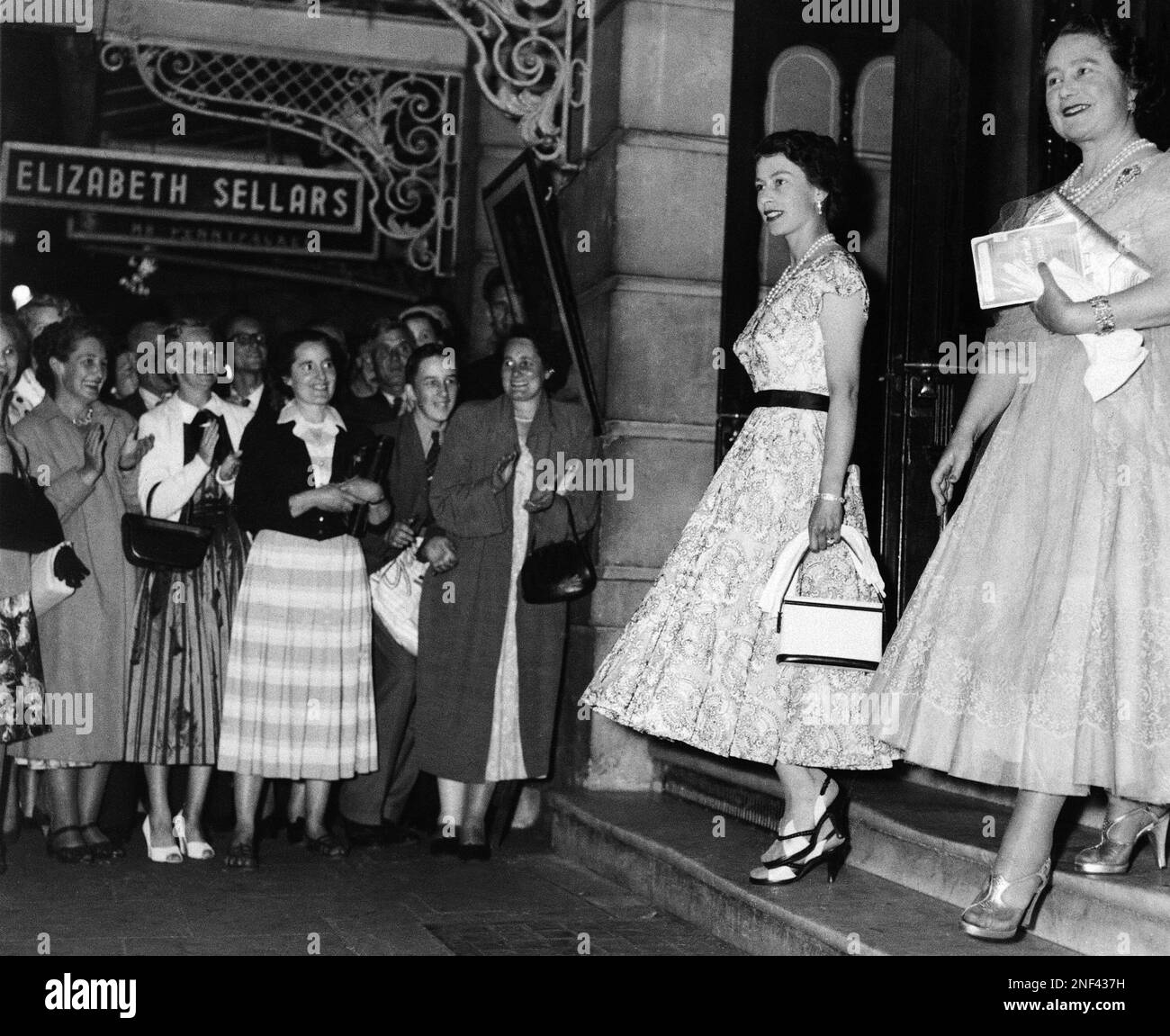 Queen Elizabeth II and her mother, Queen Elizabeth, are applauded by ...
