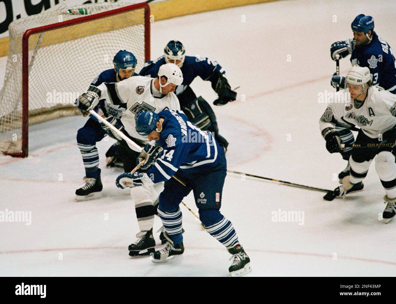 Toronto Maple Leafs left wing, Dave Andreychuk collides with Los ...