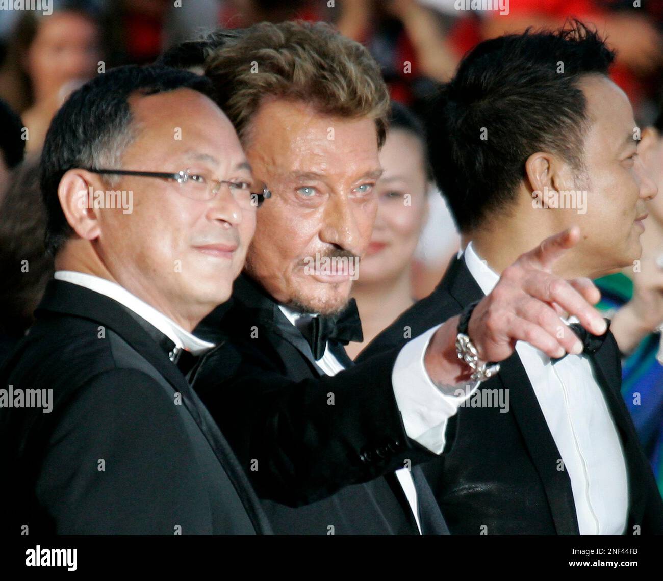 Chinese director Johnnie To, left, and French actor Johnny Hallyday ...