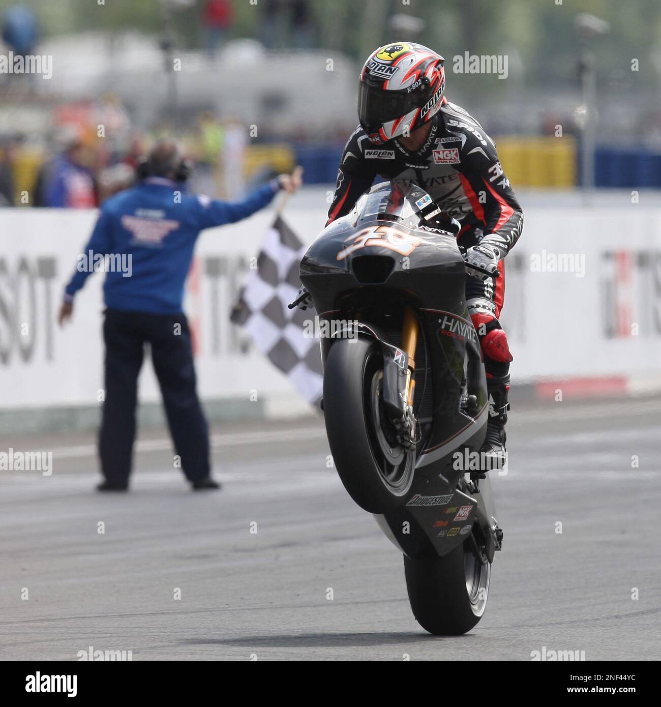 Spanish rider Jorge Lorenzo crosses the finish line on his Yamaha to ...