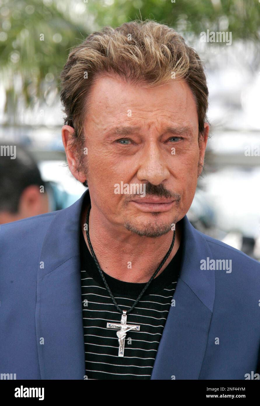 French actor Johnny Hallyday poses during a photo call for the film ...