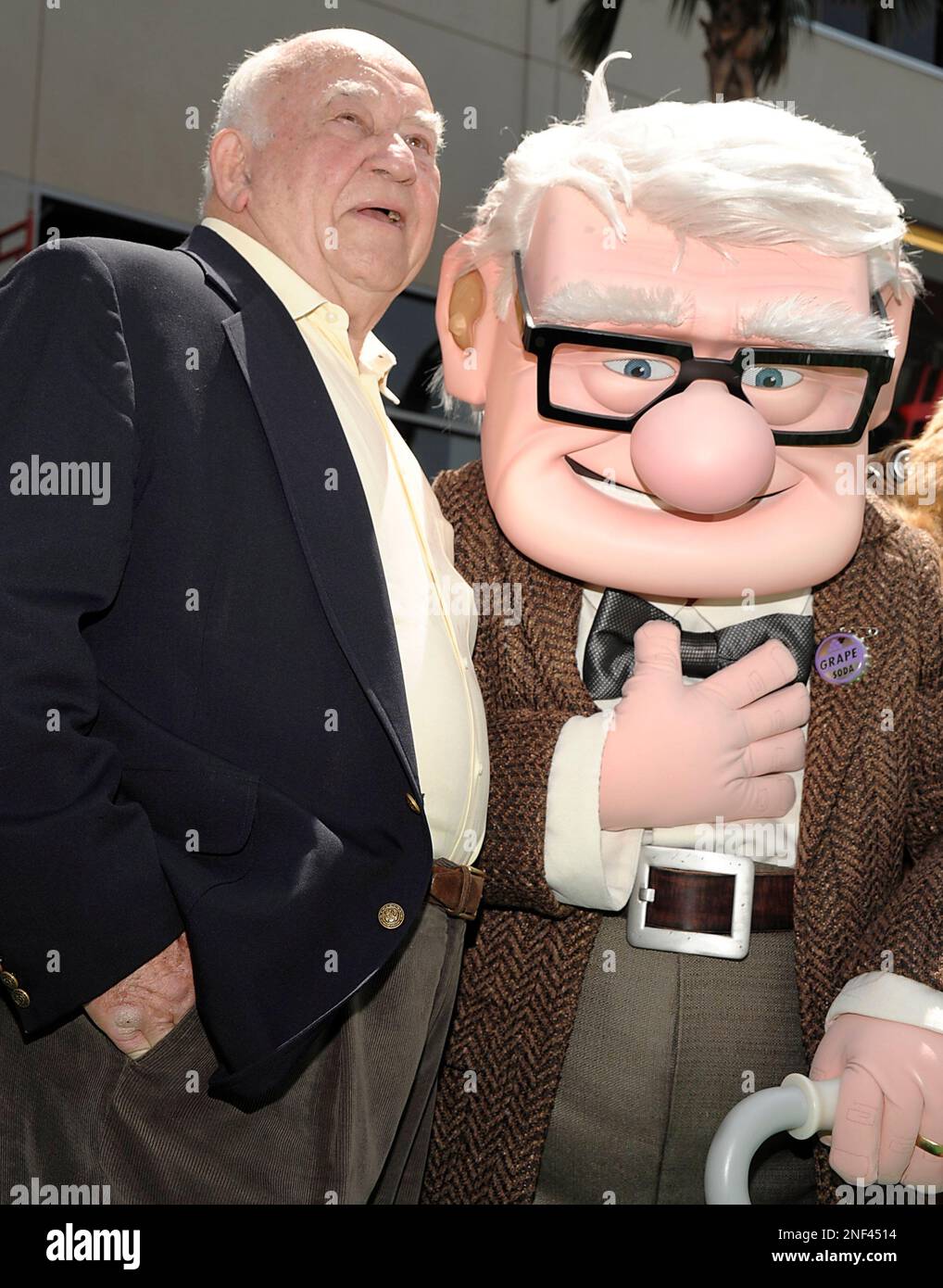 Actor Ed Asner, left, and the character he voices in the film, Carl ...