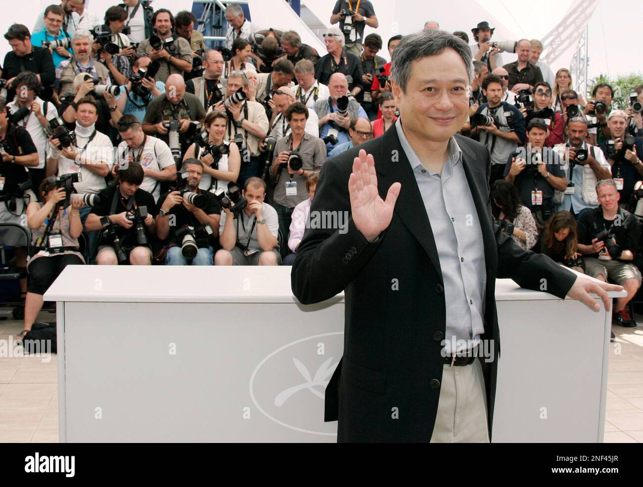Taiwanese director Ang Lee poses at a photo call for the film 'Taking ...