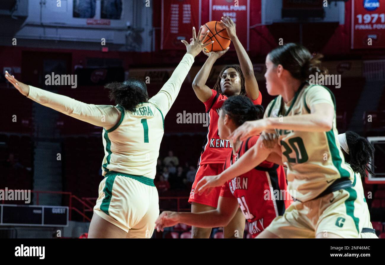 Western Kentucky guard Karris Allen, center top, looks to shoot over ...