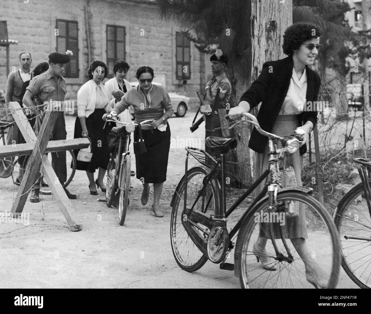Dismissed Greek Cypriot women employees leaving the Naafi (Navy, army ...