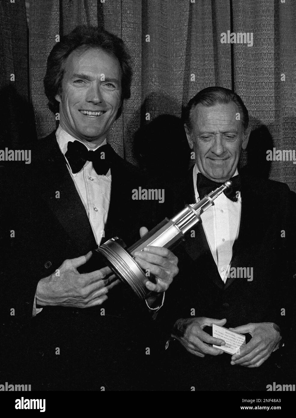 Clint Eastwood holds an award, Feb. 11, 1980, in Los Angeles. (AP Photo ...