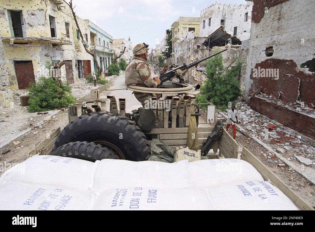 U.S. Marine Cpl. Roy Edington, form Midway, Ky, mans a gun turret atop ...