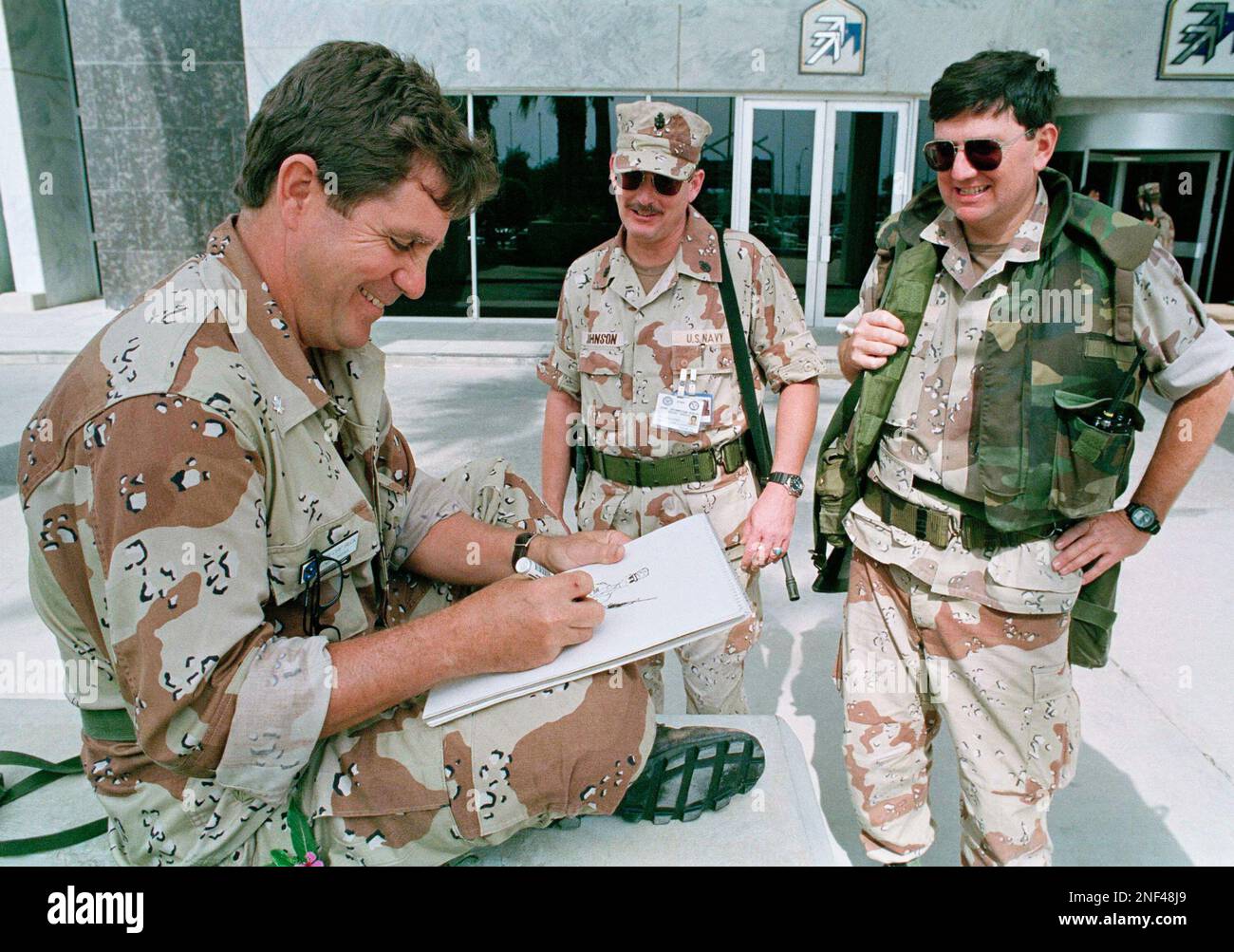 U.S. Navy Lt. Commander Chip Beck, a combat artist from Arlington, Va ...