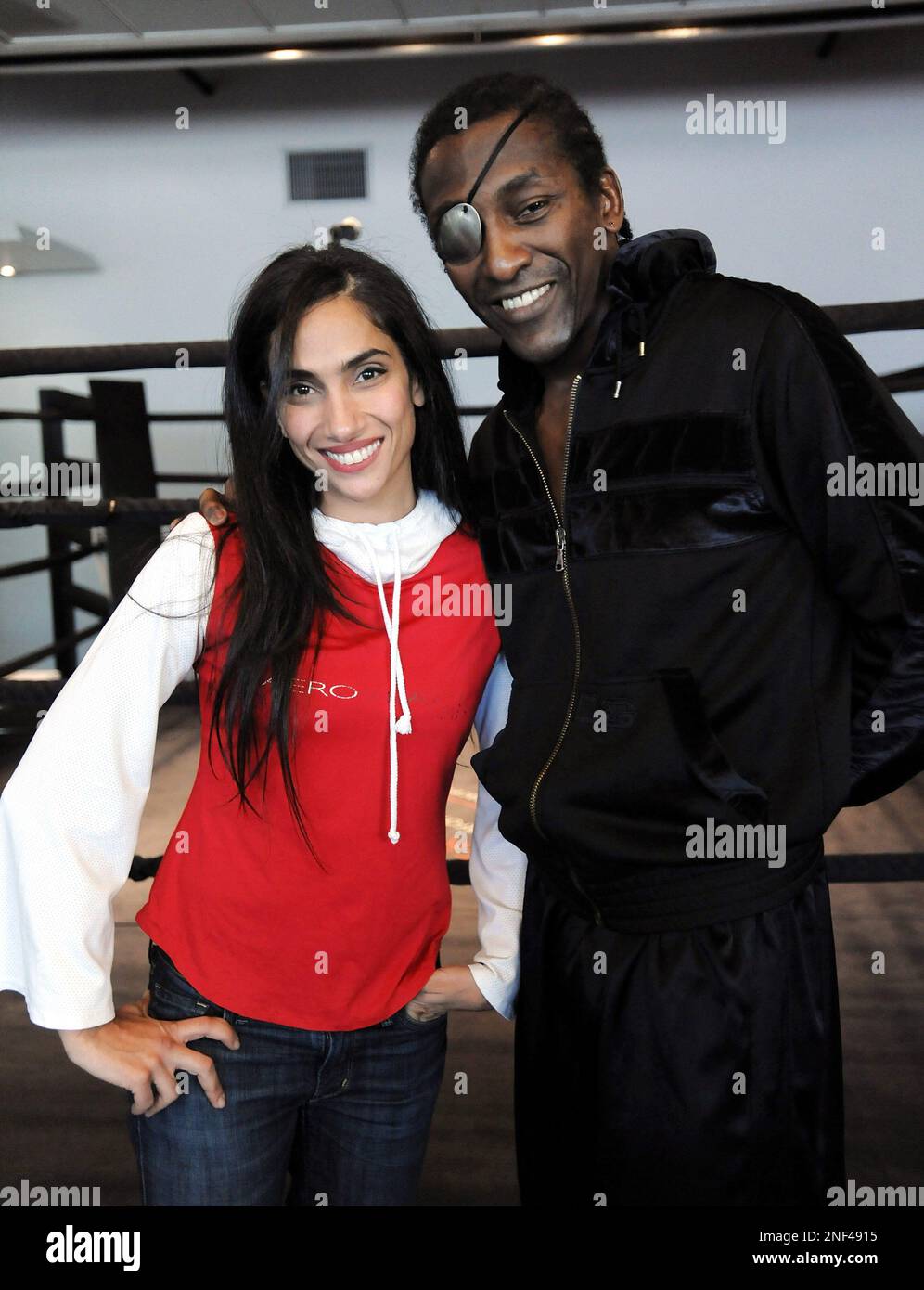Former middleweight champion Michael Olajide Jr. and Leila Fazel, left ...
